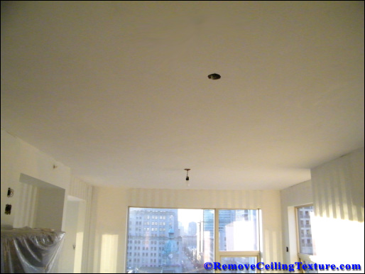 Raw concrete slab transformed into beautiful smooth ceiling in Downtown ...
